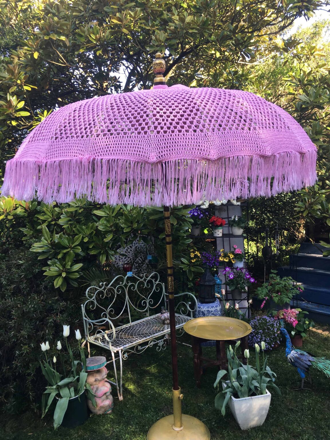 Pink woven macrame umbrella